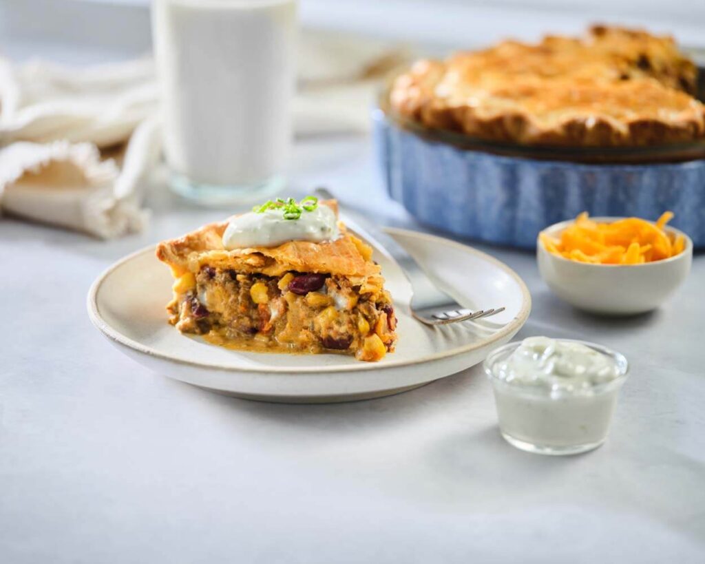 Cheesy Tex-Mex Pie with Lime Crema - Milk